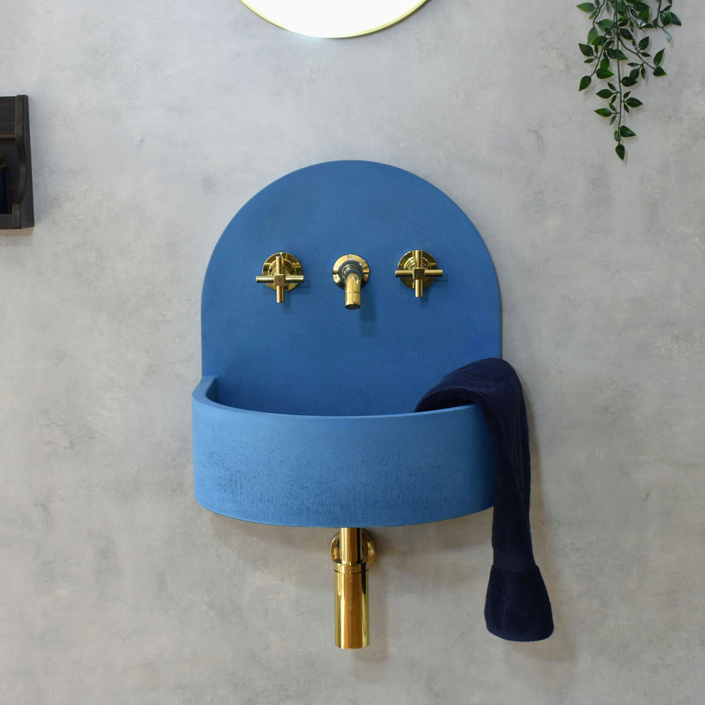 Wall-mounted blue concrete basin and sink – kreaconcrete